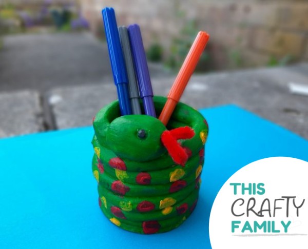 Handmade clay snake pots - This Crafty Family - crafts for kids.