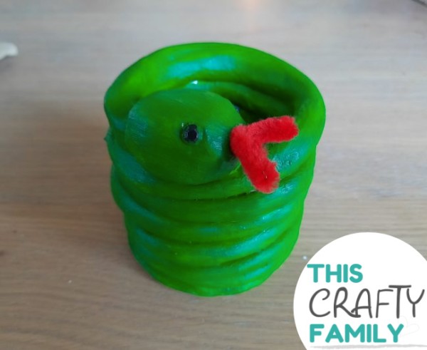 Handmade clay snake pots - This Crafty Family - crafts for kids.
