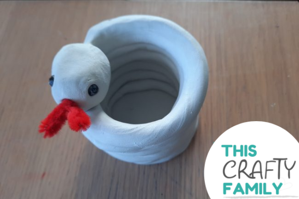 Handmade clay snake pots - This Crafty Family - crafts for kids.