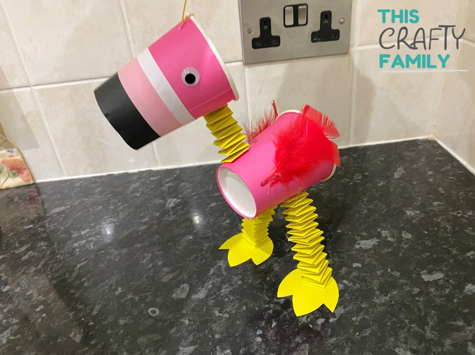 Paper cup flamingo puppet - This Crafty Family